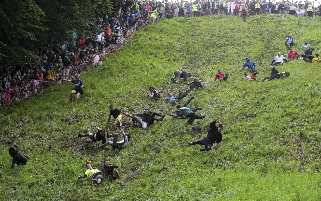 Chasing cheese wheels or lugging sacks of wool, UK competitors embrace ...