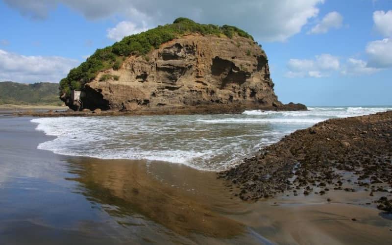 One in hospital after rescue at Bethells Beach, Auckland | RNZ