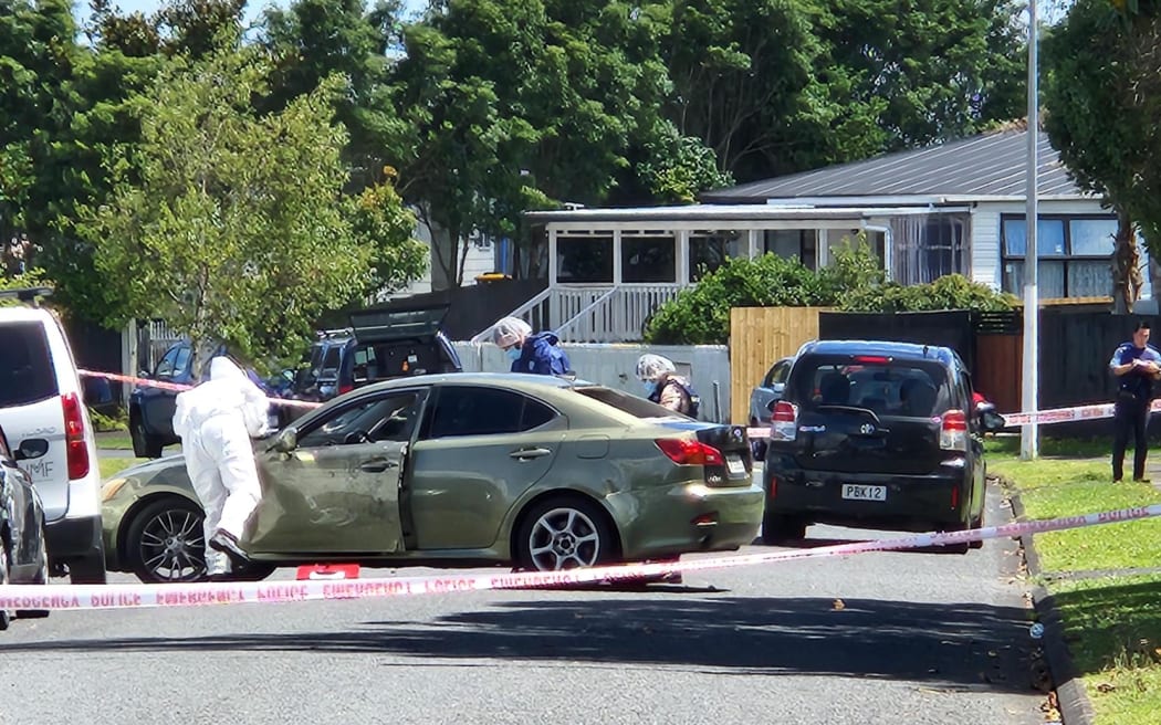 Armed police in Auckland suburb after two men found injured in vehicle ...