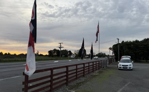 Ngāti Tukorehe to fly more flags after 'racist attack' on its whenua | RNZ