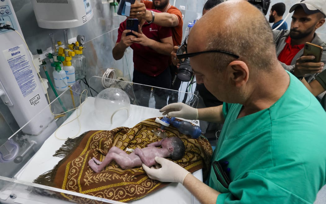 Baby in Gaza saved from womb of mother killed in Israeli strike | RNZ News