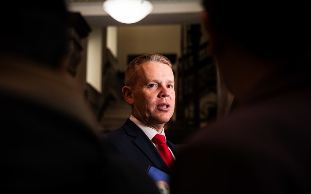 Former Covid-19 response minister Chris Hipkins reacts to Royal ...