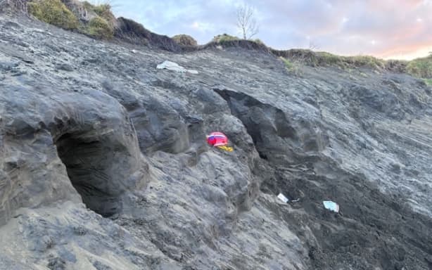 Person in critical condition after being trapped under collapsed sand ...