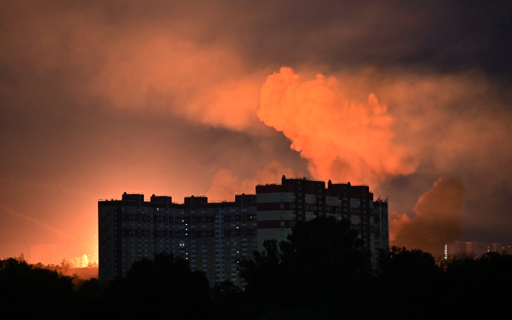 Kyiv hit by deadly Russian strikes, people feared trapped in apartment ...