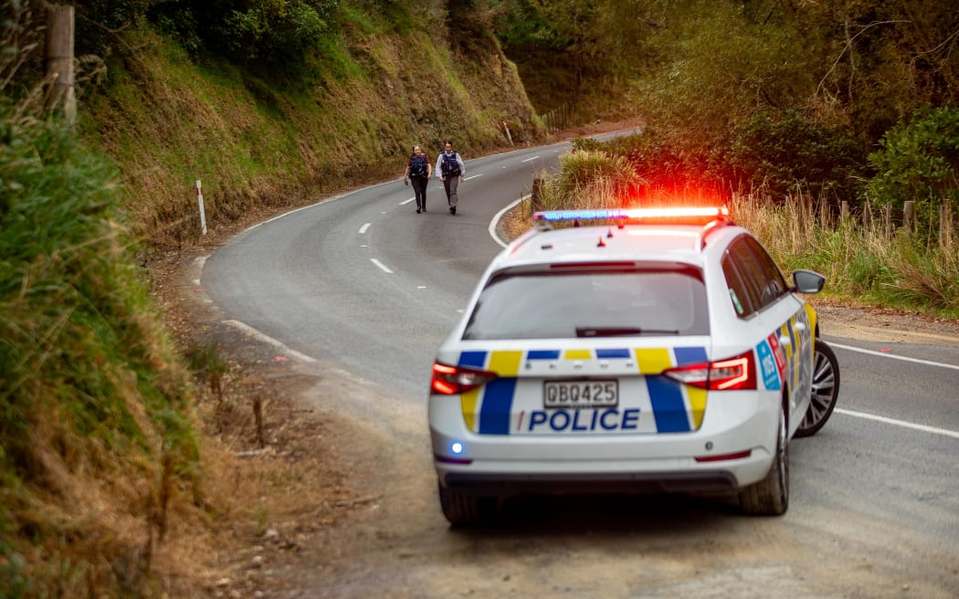 Two dead after car flips upside down into stream in Wellington | RNZ News