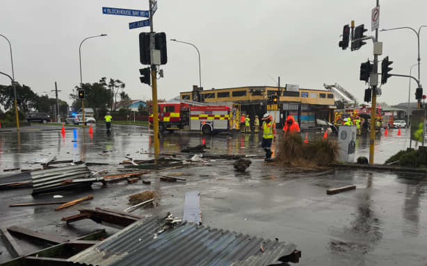 Wild weather: Auckland road reopens after debris from fallen roof ...