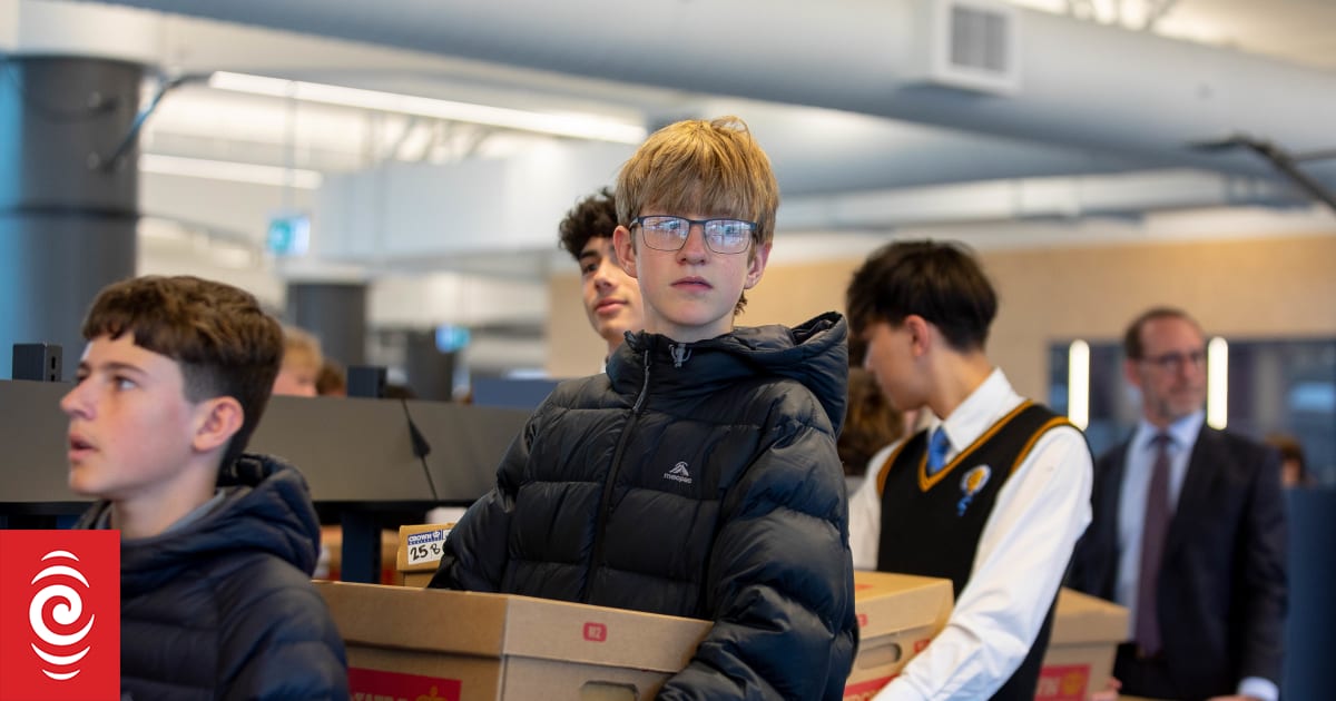 Wellington teens do the heavy lifting to help fill the new library's ...