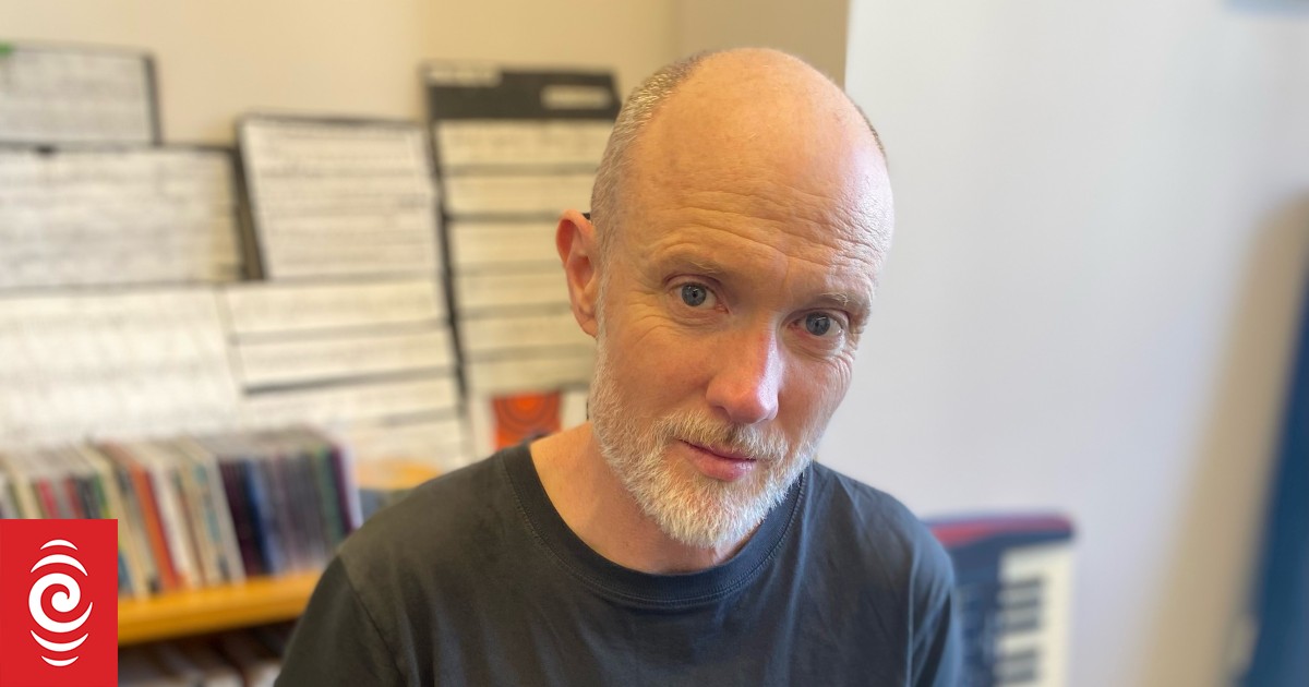 Orchestra performing with kōhatu, riverstones | RNZ