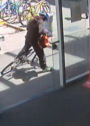 Cyclist sought over gunpoint bank robbery | RNZ