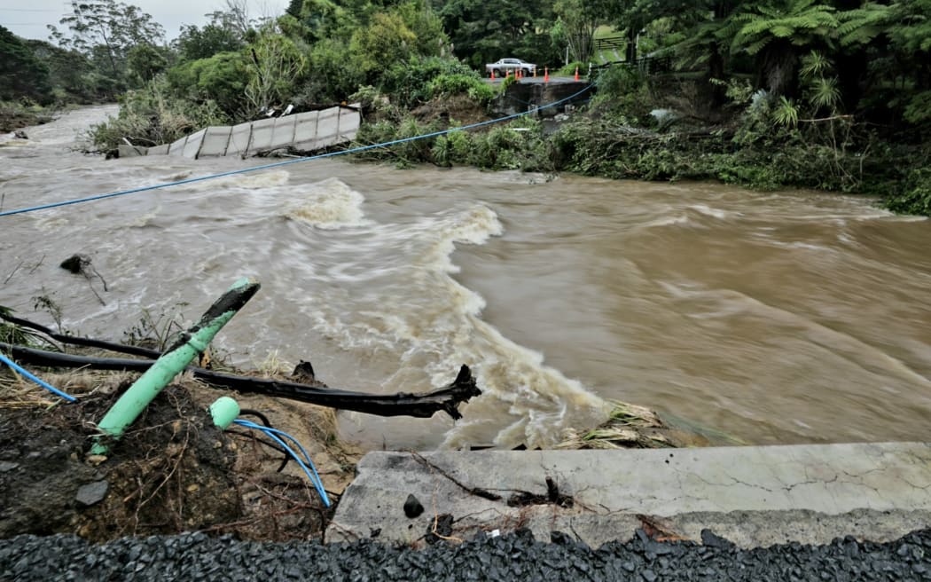 Flood-destroyed bridge in Auckland replaced with temporary fix in under ...