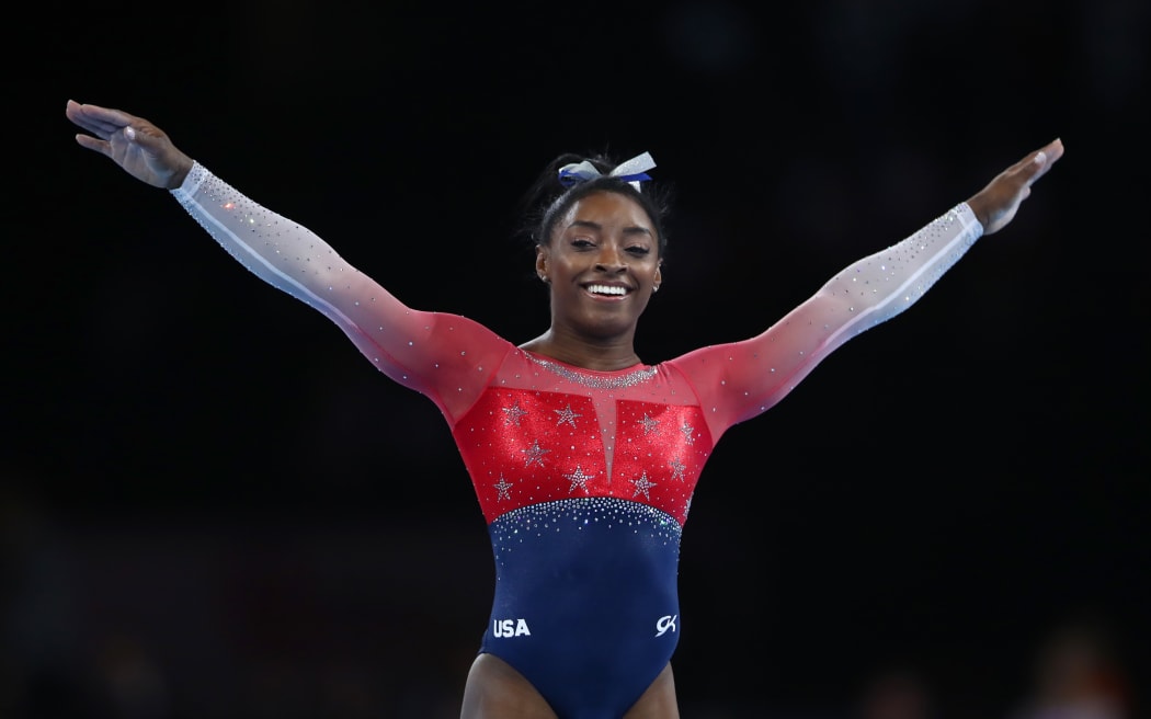 Olympics: Stephen Curry and Simone Biles vie for medals and pins in ...