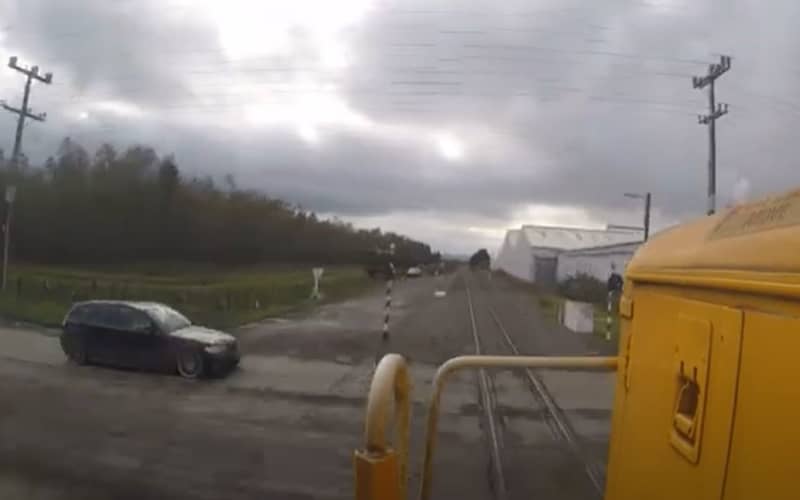 Video: Car is driven onto railway tracks, gets hit by train | RNZ