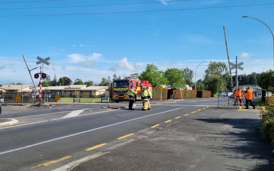 Car and freight train collide in Hamilton, two people seriously injured ...