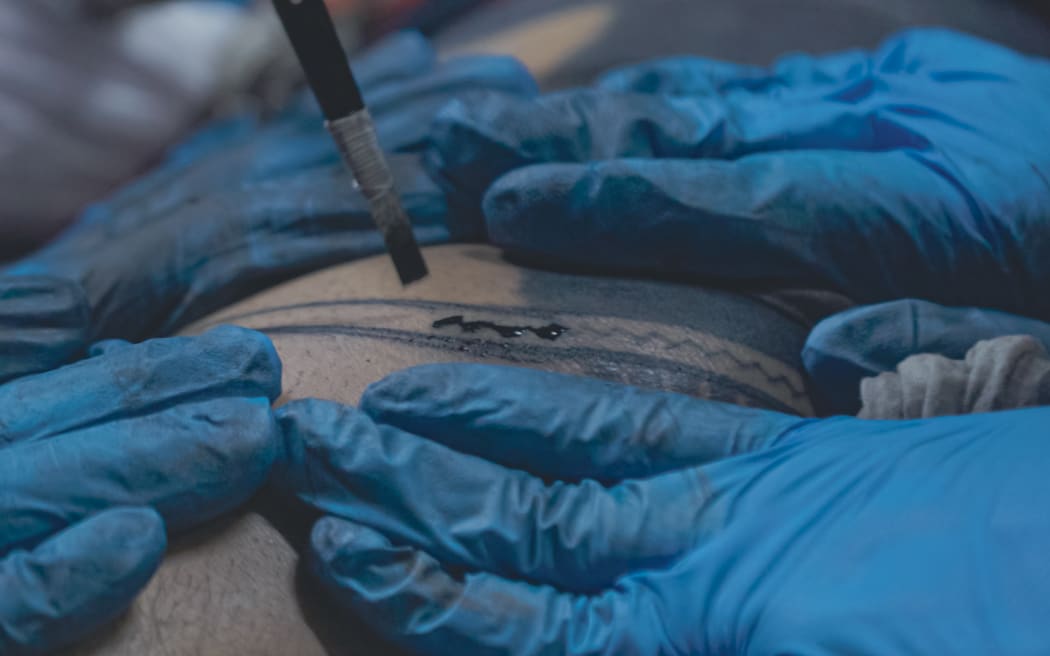 Paving the way home: Navigating the tatau, identity, tradition, and ...