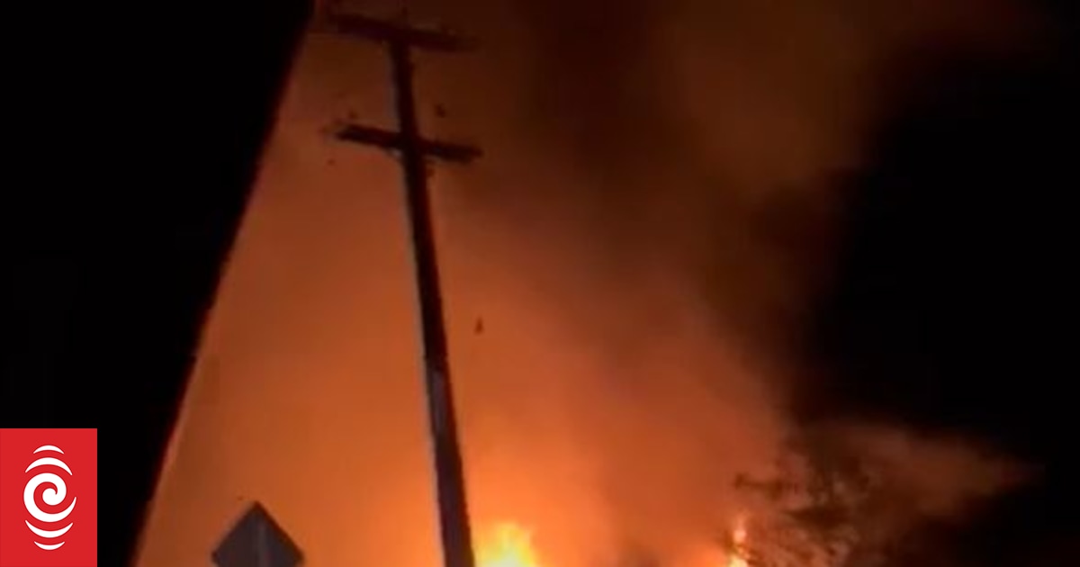 Woman and child escape Auckland house fire, gang at scene | RNZ News