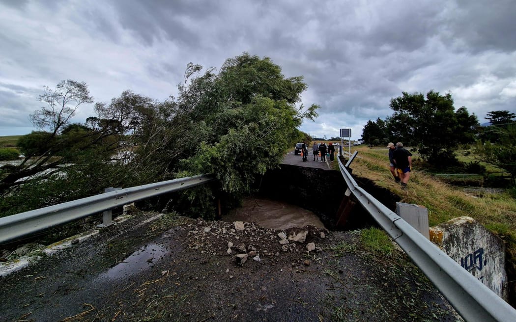 'Lifeline' Lake Ferry Road bridge gouged out by raging floodwaters in ...