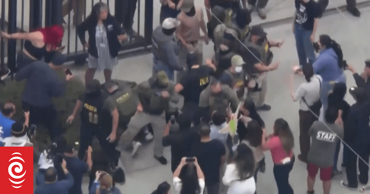 Riot police, anti-ICE protesters square off in Los Angeles after raids ...