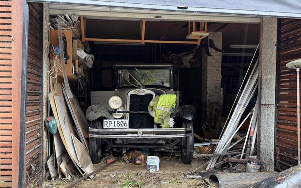 Vintage cars, stamp collection damaged by floodwaters in wild ...