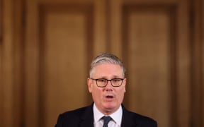 Senior UK minister resigns, calls for a leadership contest to oust PM ...
