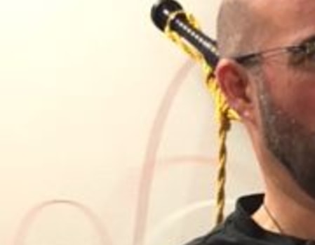 Doctor and champion piper Brendon Eade | RNZ