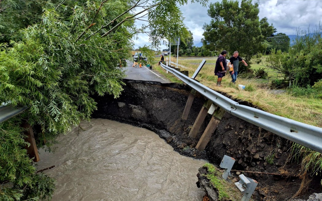 'Lifeline' Lake Ferry Road bridge gouged out by raging floodwaters in ...
