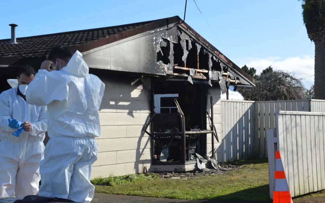 Punk rock musician found dead in burnt-out house, man charged with ...