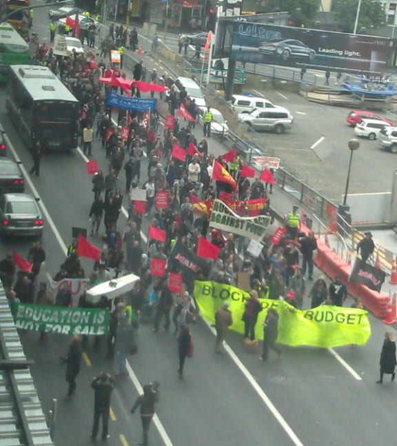 Protesters barrack National Party conference over cuts | RNZ News