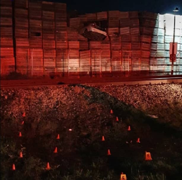 Man seriously injured after airborne car gets stuck in fruit bins | RNZ