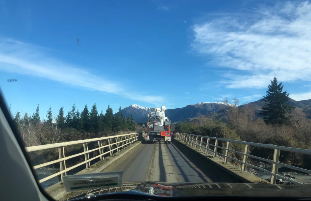 Heavy vehicles test soundness of Ashburton bridge | RNZ News