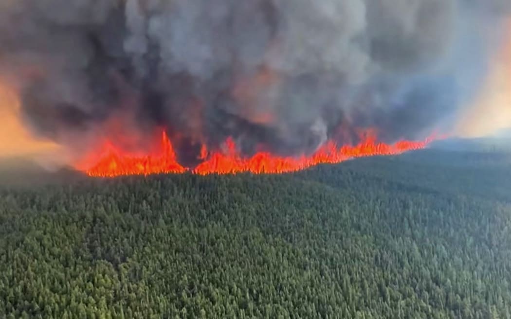 Wildfires spread in British Columbia, Quebec sees signs of progress ...