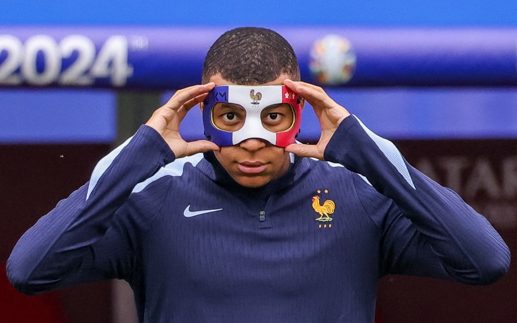 Kylian Mbappe fit to face Netherlands - wearing a mask | RNZ News