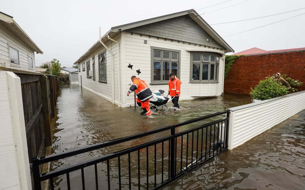 Dunedin begins cleanup after record rainfall causes severe flooding ...