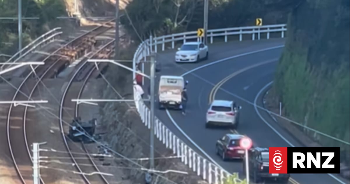 Wellington train line resumes after car crashes onto tracks, hit by ...