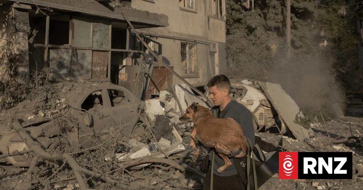 Kyiv hit by deadly Russian strikes, people feared trapped in apartment ...