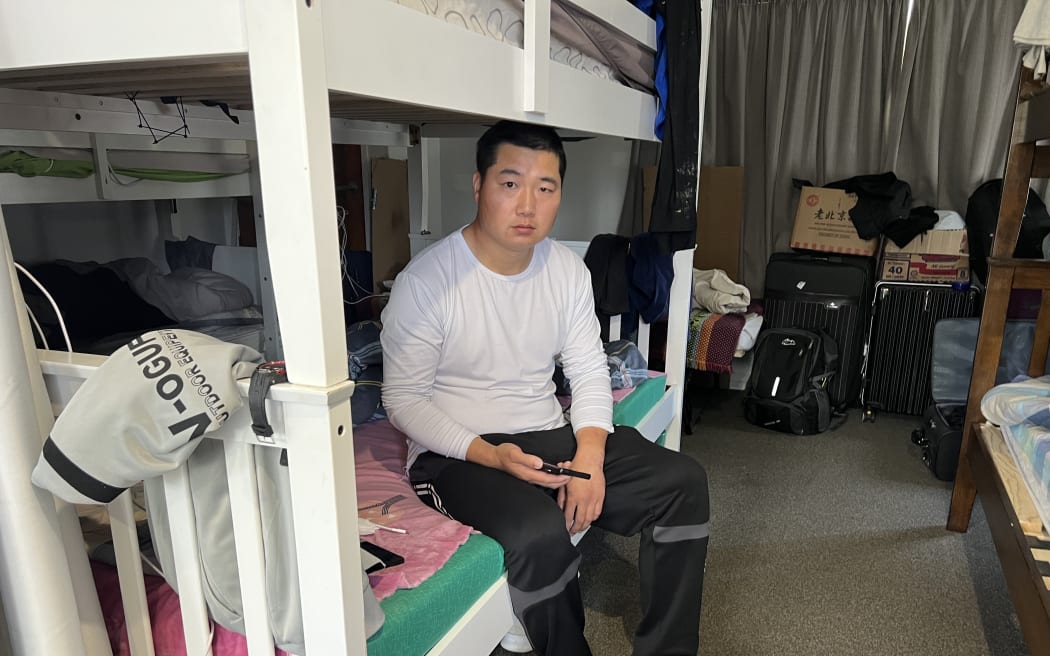 Chinese migrant workers ensnarled in crowded Auckland accommodation ...
