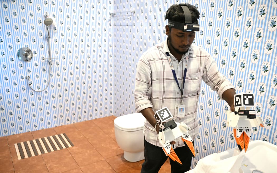 The Indian workers training AI robots to take their jobs | RNZ News