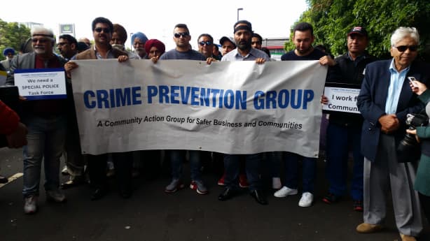 Dairy owners' march against violent crime draws hundreds | RNZ