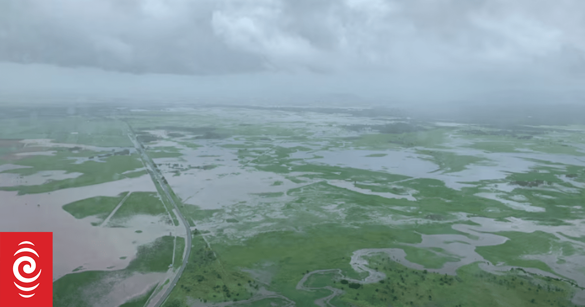 Queensland town's residents urged to find high ground as flood disaster ...