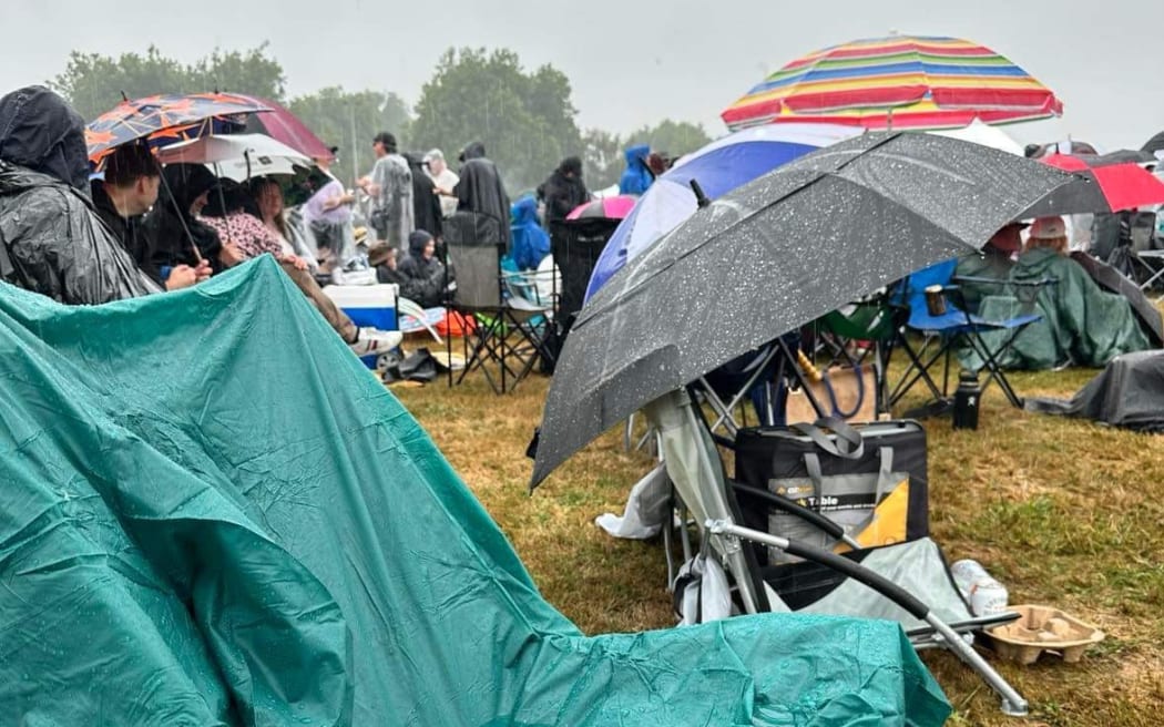 Stormy weather causes concert evacuation, road slips | RNZ News