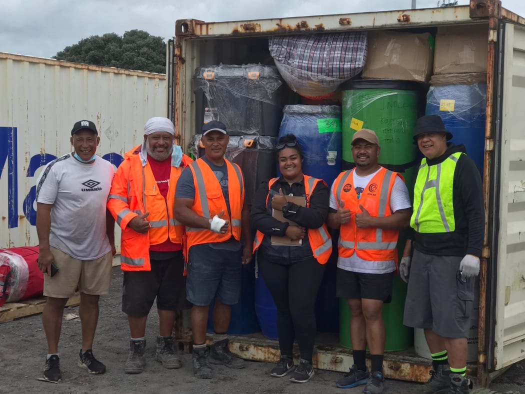 Volunteers put heart and soul into loading aid containers for Tonga ...