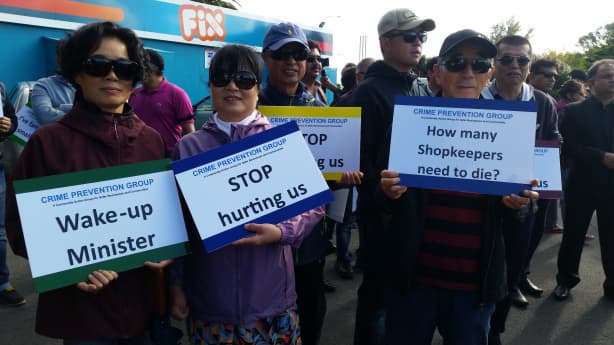 Dairy owners' march against violent crime draws hundreds | RNZ