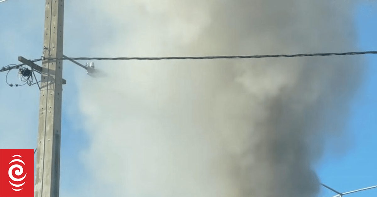 Auckland bus catches fire outside Birkenhead depot | RNZ News