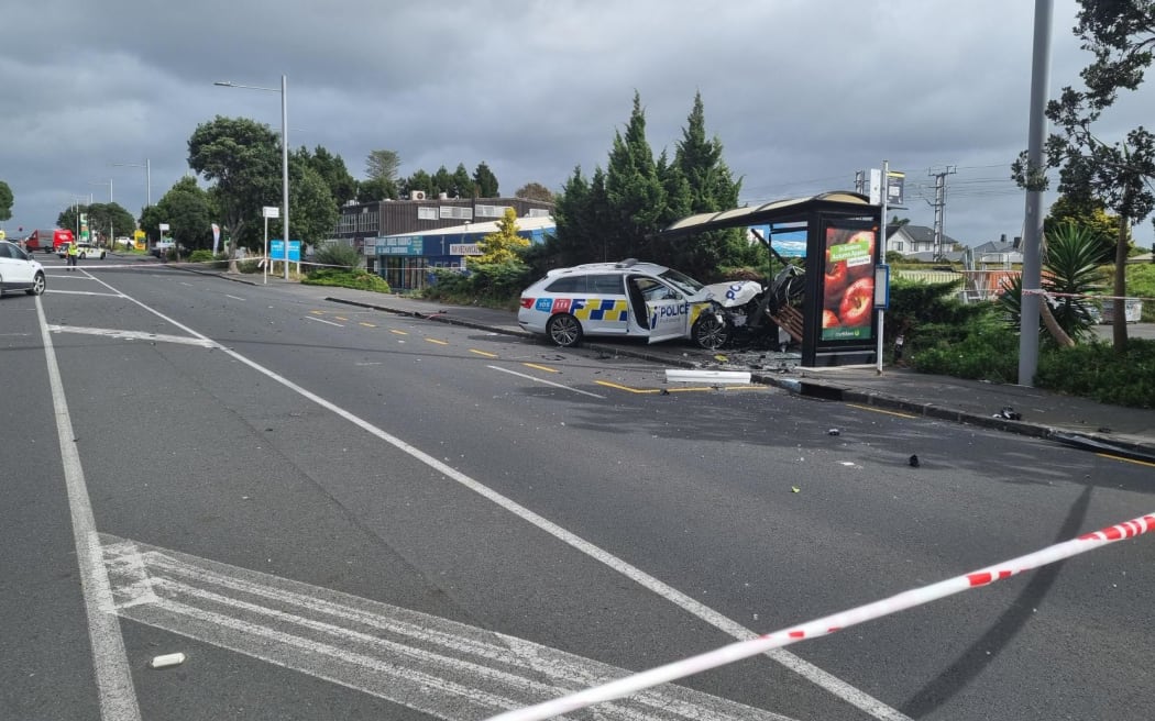 Delays for commuters after crash involving police car closes Auckland ...