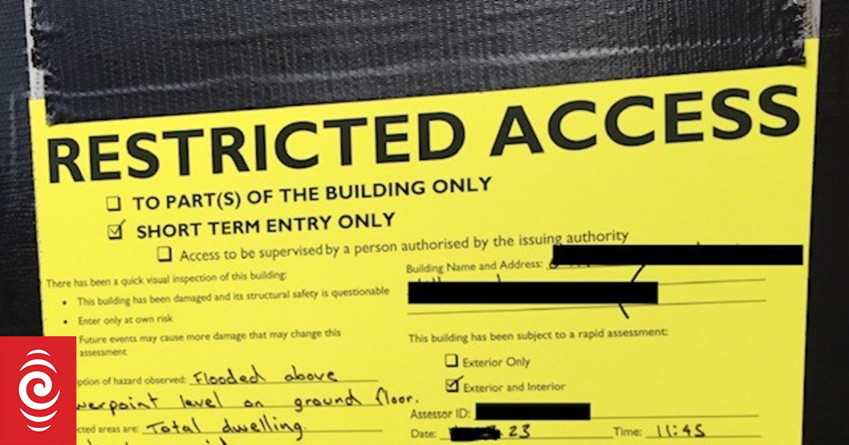 Yellow placard at flood-damaged home taken down without clear ...